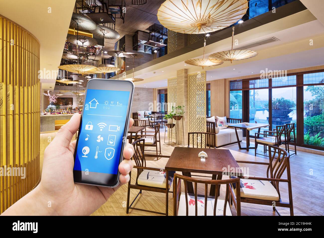 smart phone with smart home with modern dining room Stock Photo - Alamy