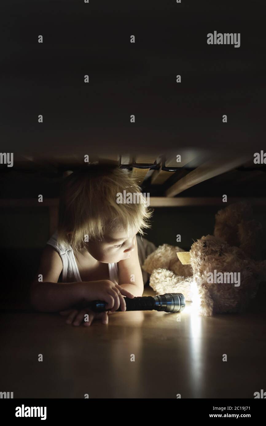 Scared Child Hiding High Resolution Stock Photography and Images - Alamy