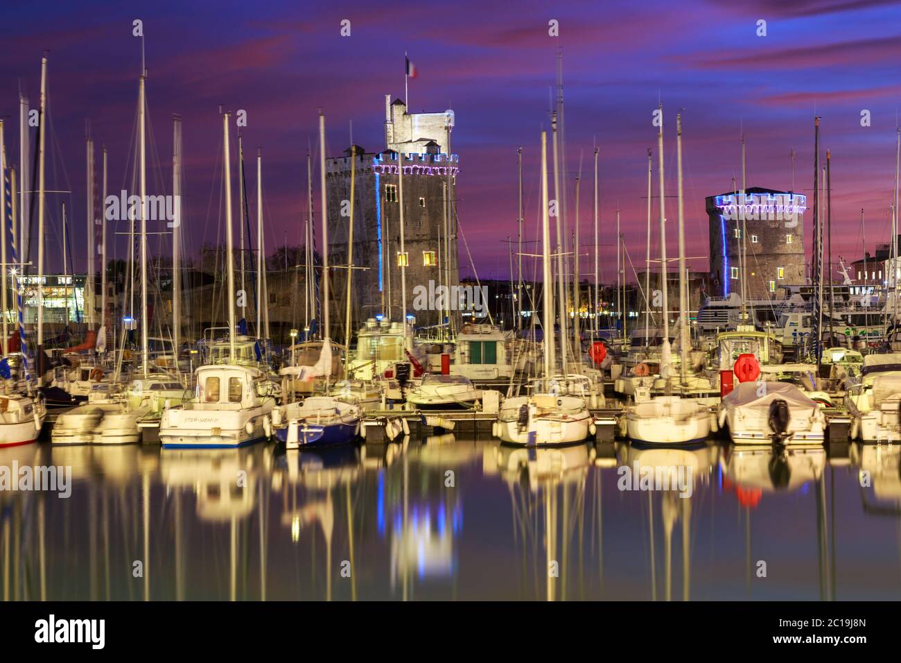 La Rochelle - Harbor by night with beautiful sunset Stock Photo - Alamy