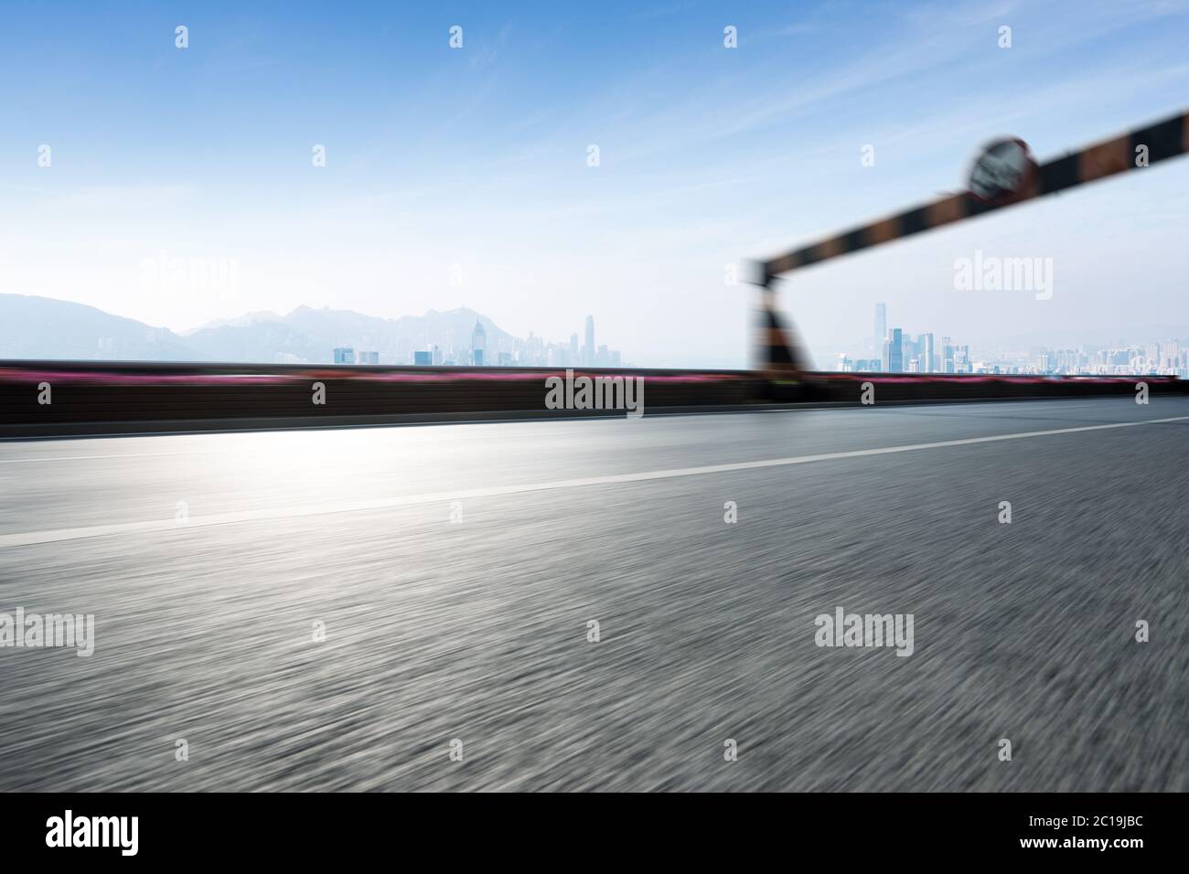 blurry empty asphalt road with modern cityscape Stock Photo - Alamy