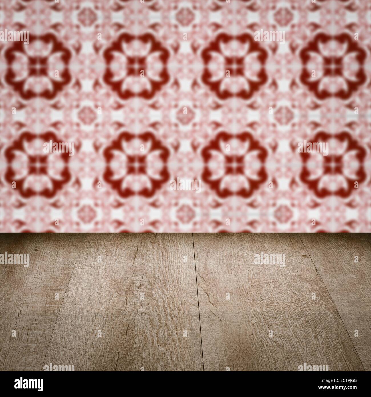 Empty wood table top and blur vintage ceramic tile pattern wall in ...