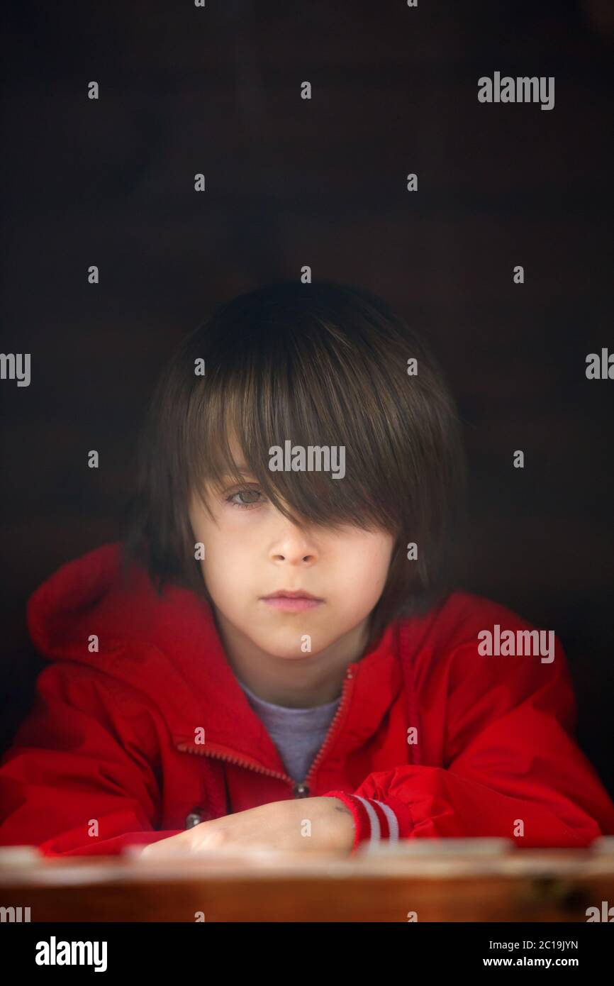 Children hiding in wardrobe hi-res stock photography and images - Alamy