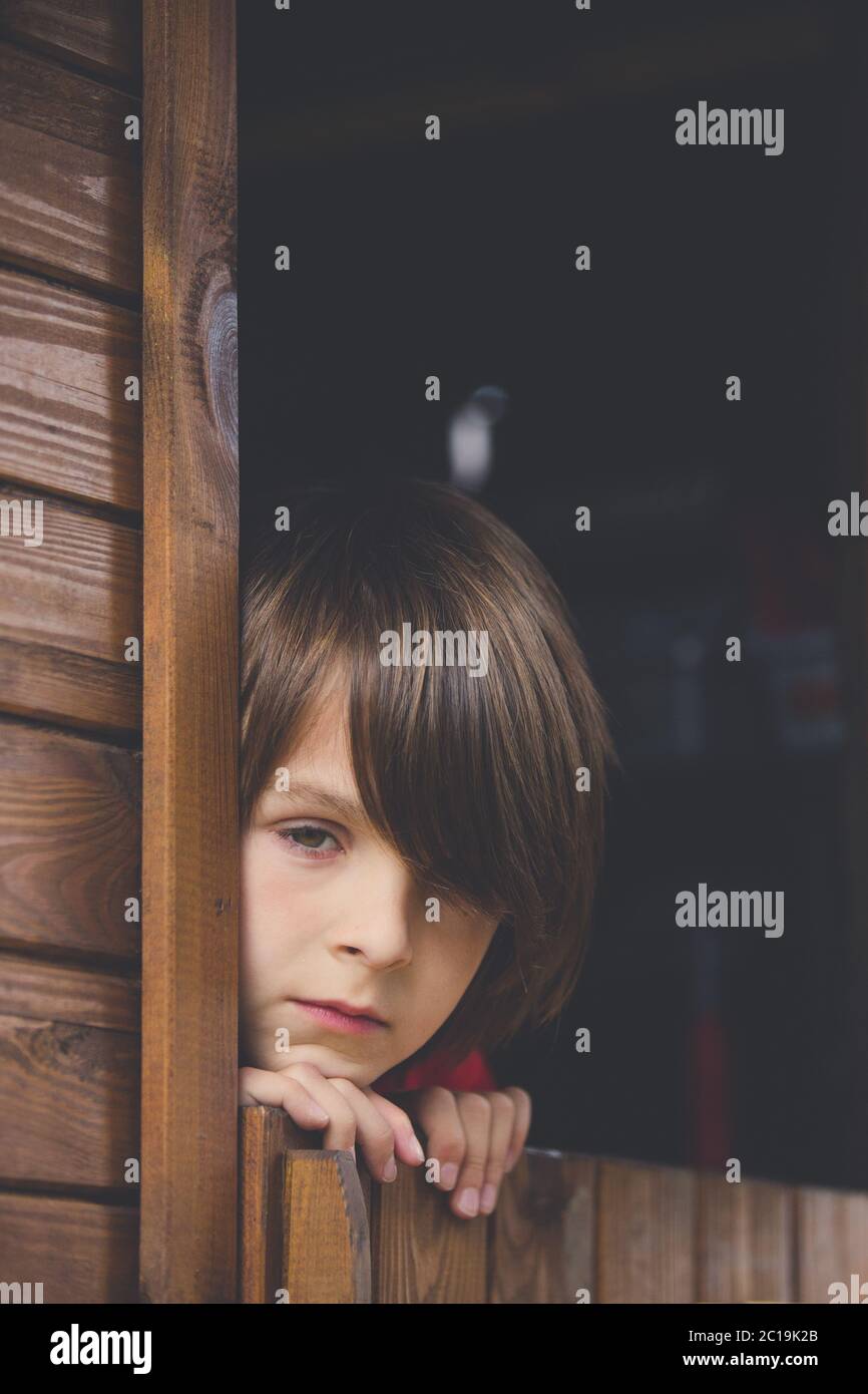 Children hiding in wardrobe hi-res stock photography and images - Alamy
