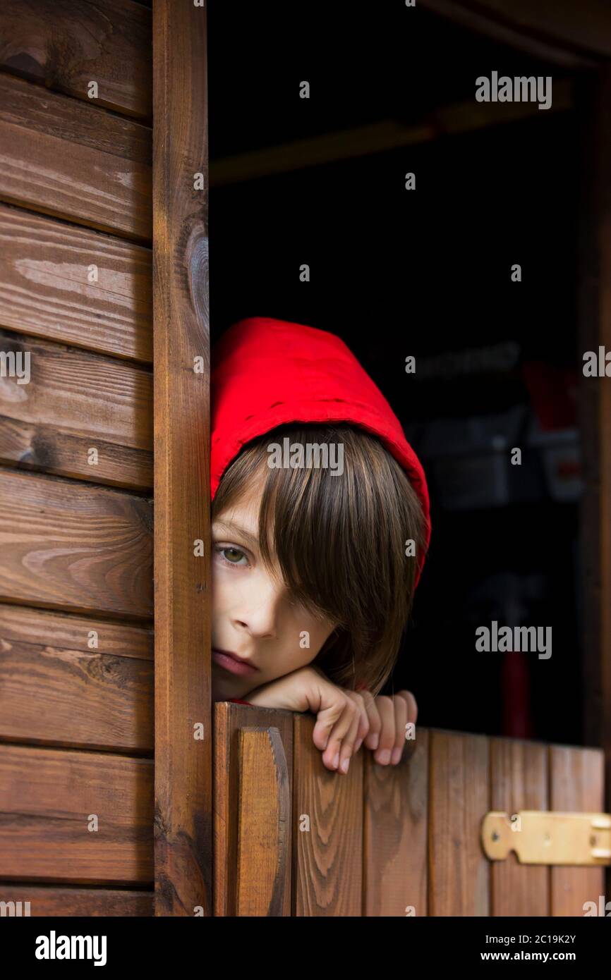 Children hiding in wardrobe hi-res stock photography and images - Alamy