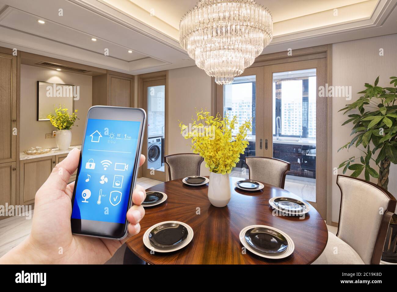 smart phone with smart home with modern dining room Stock Photo - Alamy