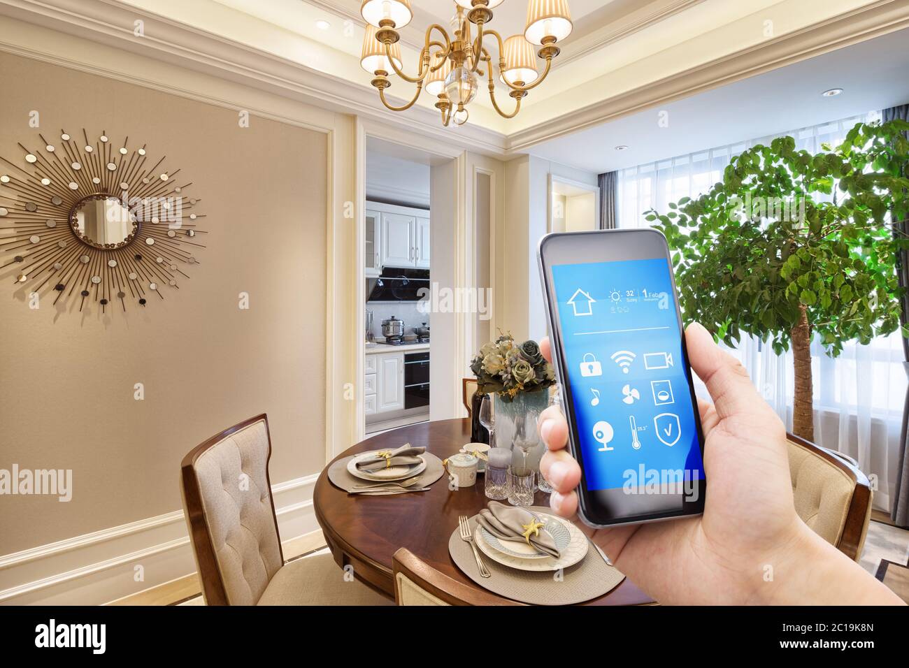 smart phone with smart home and modern dining room Stock Photo - Alamy