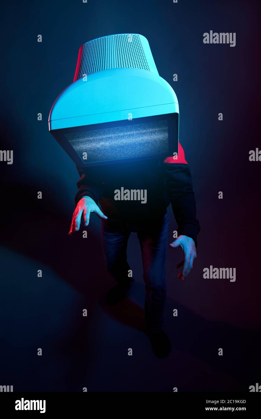 Man with a TV monitor for a head. Propaganda from the TV screen Stock ...