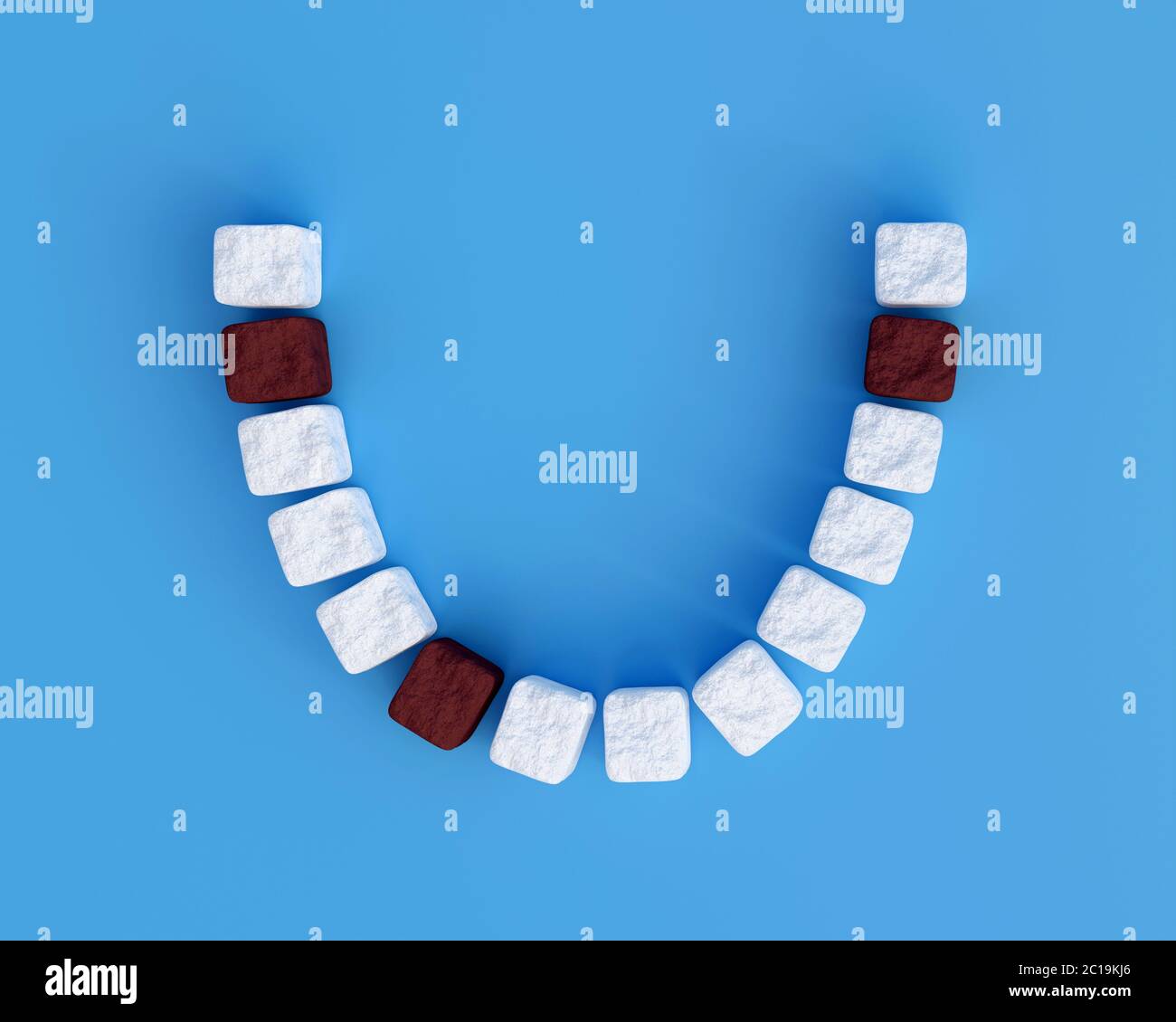 Teeth from sugar cubes on blue background, some brown sugar teeth ...