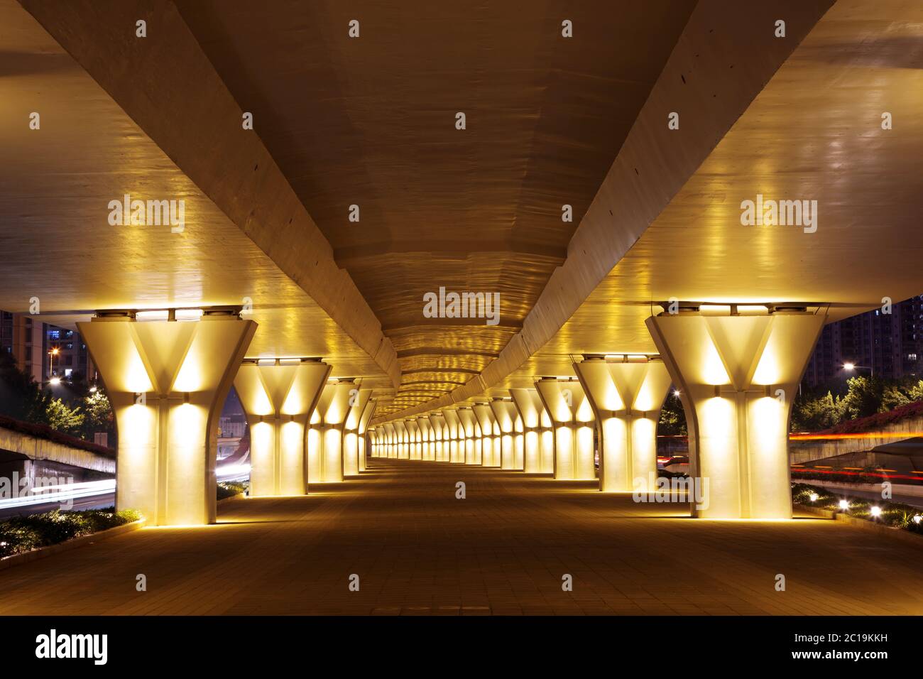 Empty road below bridge night bridge hi-res stock photography and ...