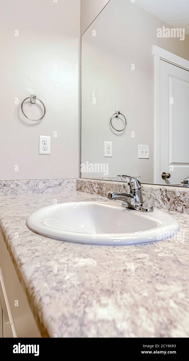 Vertical frame Top mount sink with stainless steel faucet on bathroom ...