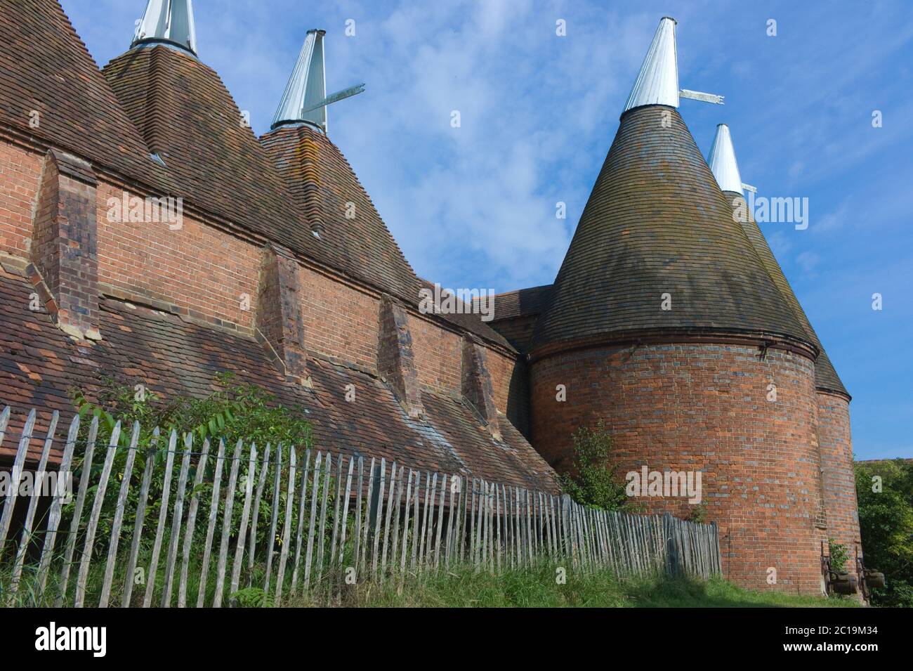 Typical oast house in Kent designed for kilning (drying) hops as part ...