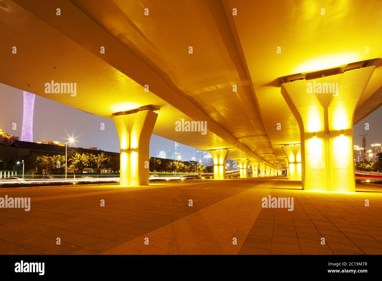 empty sidewalk below elevated road in modern city Stock Photo - Alamy