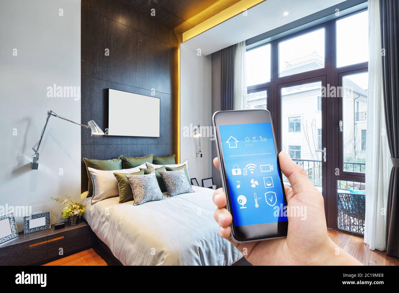 smart phone with smart home with modern bedroom Stock Photo - Alamy