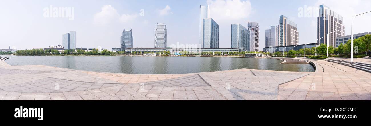 modern buildings near water in modern city Stock Photo - Alamy