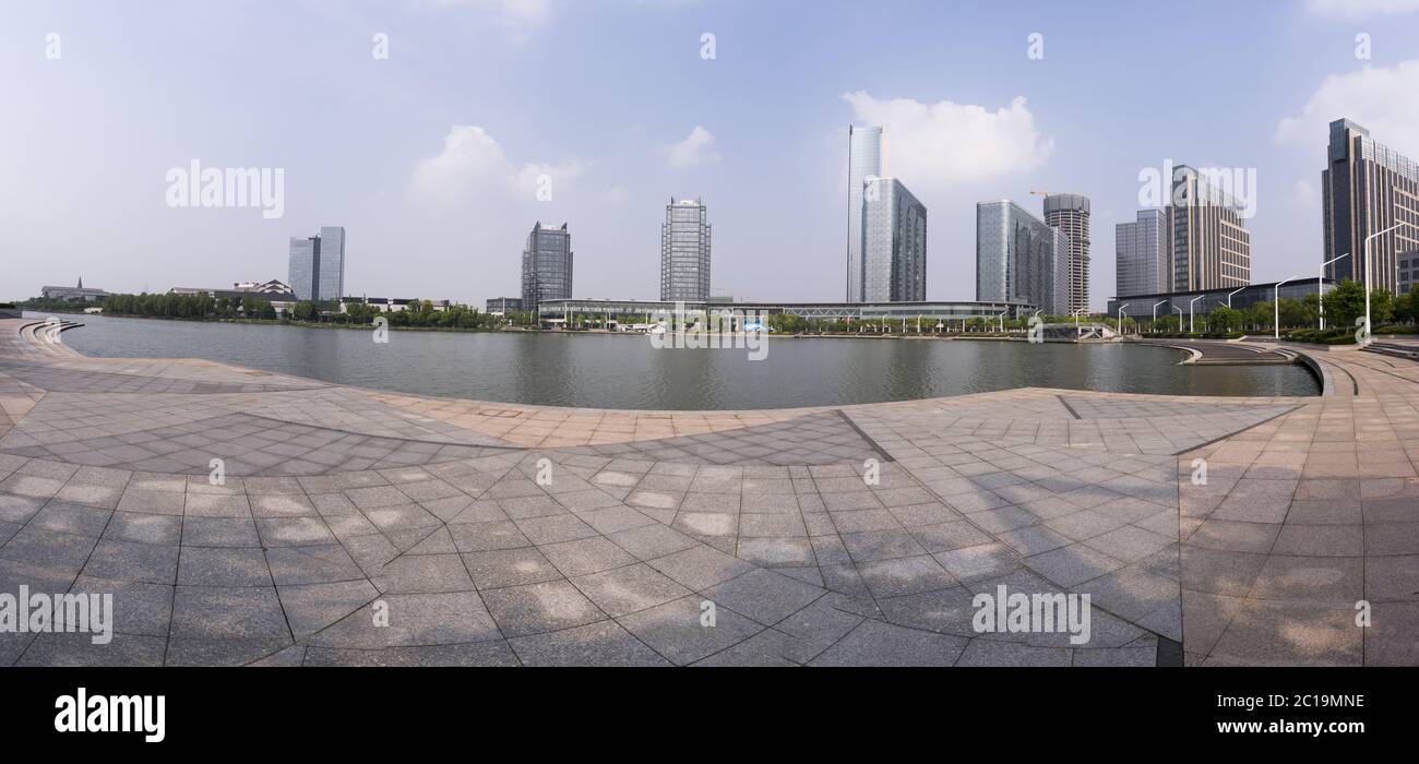 modern buildings near water in modern city Stock Photo - Alamy