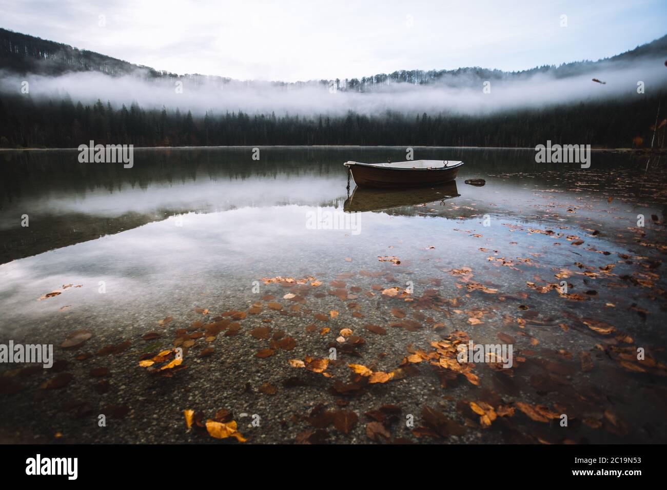 Autumn landscape wallpaper with a rowboat on lake Stock Photo - Alamy