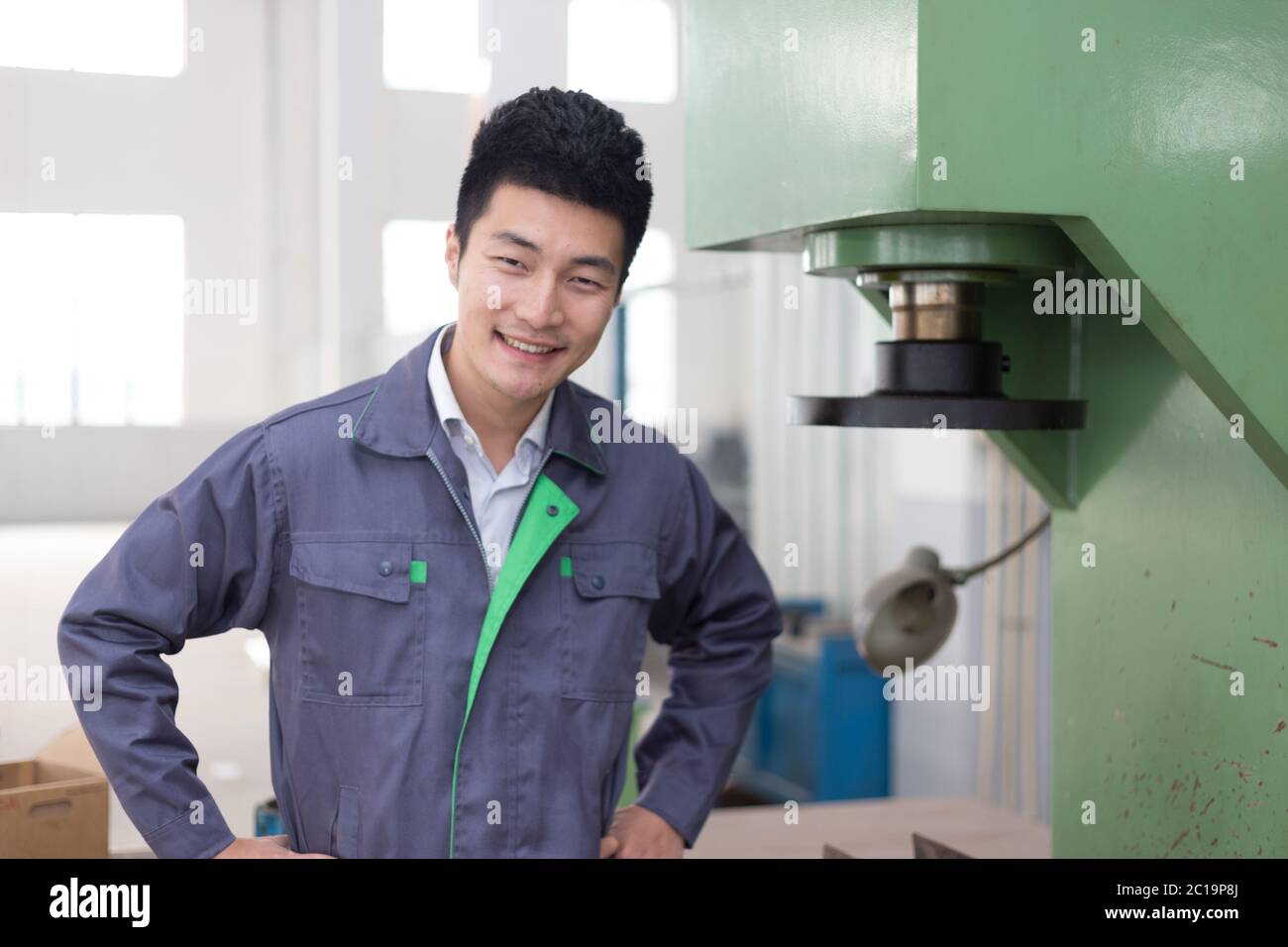 Young asian man works hi-res stock photography and images - Alamy