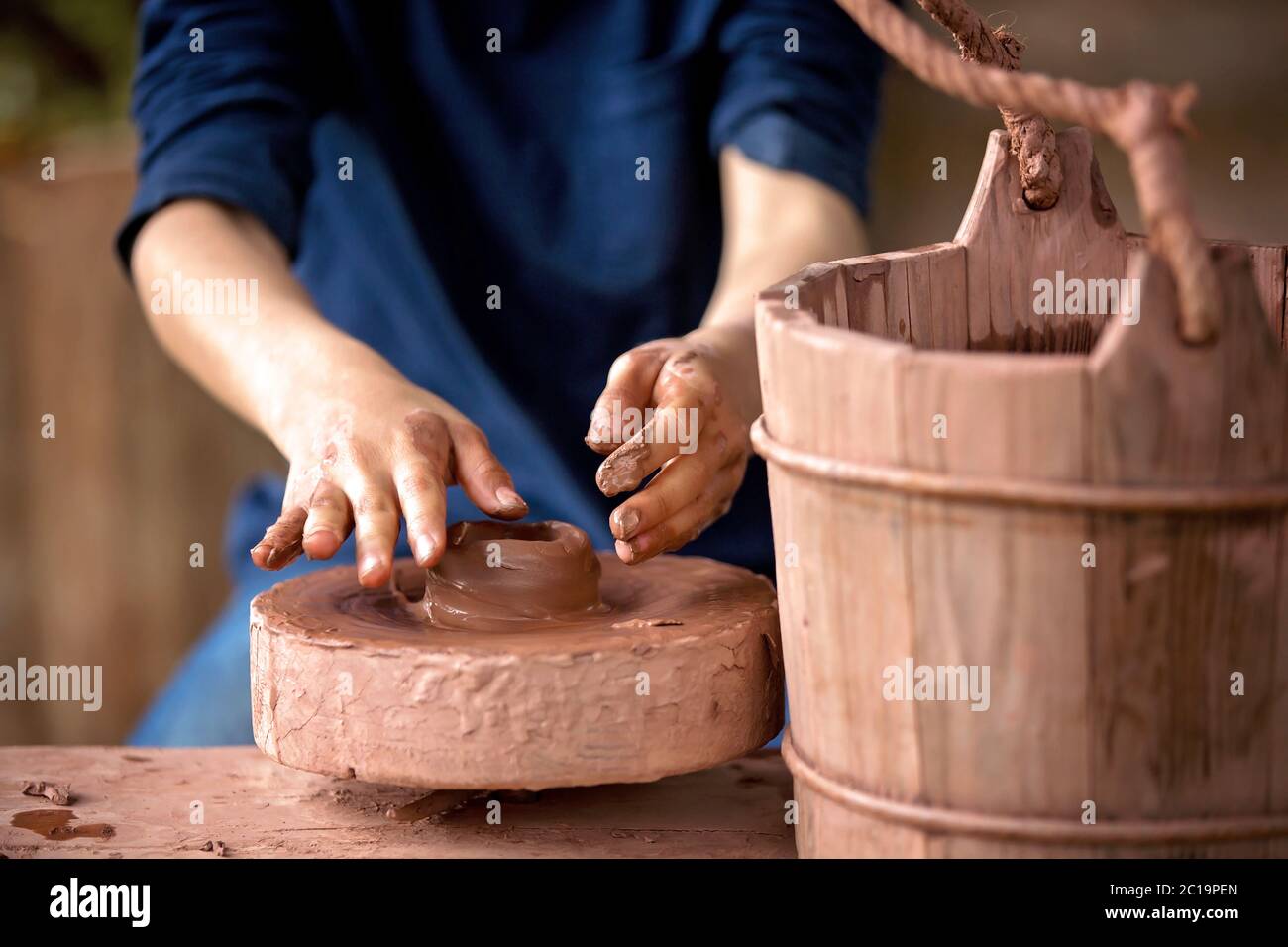 Child, cute boy, making ceramic pot on a farm Stock Photo - Alamy