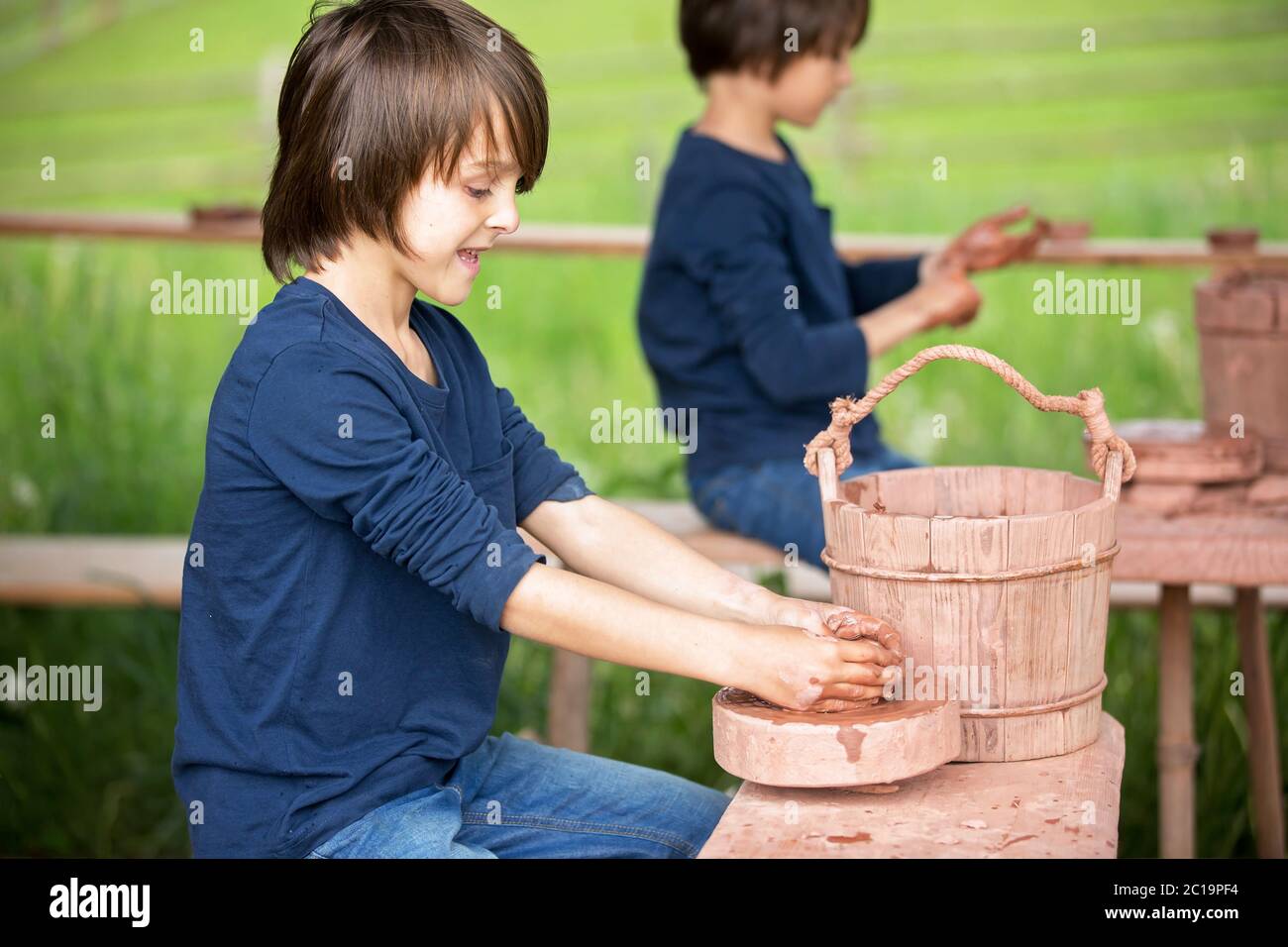 Throwing a pot child hi-res stock photography and images - Alamy