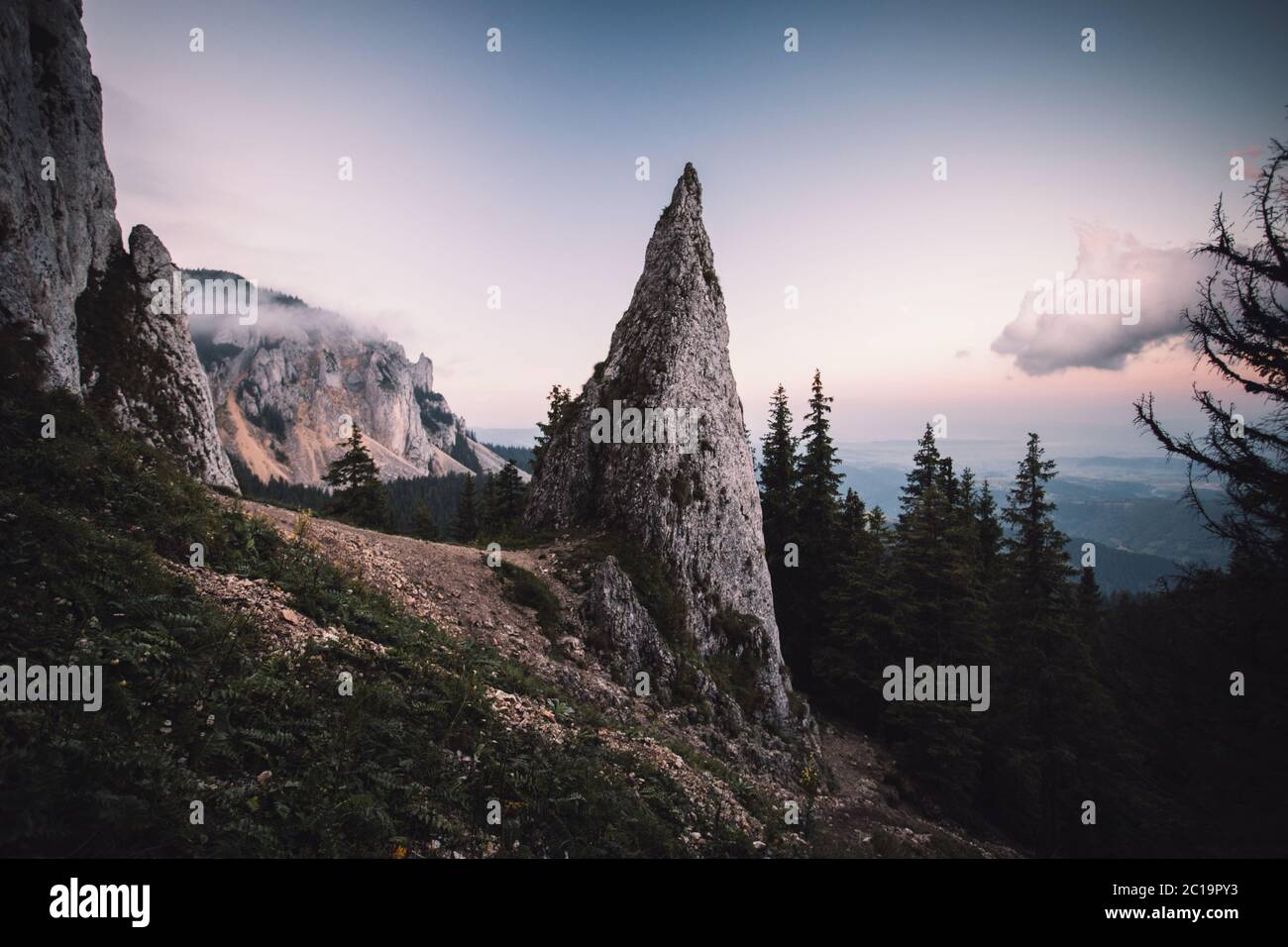 Beautiful sunrise landscape with sharp mountain peak,blue sky ...