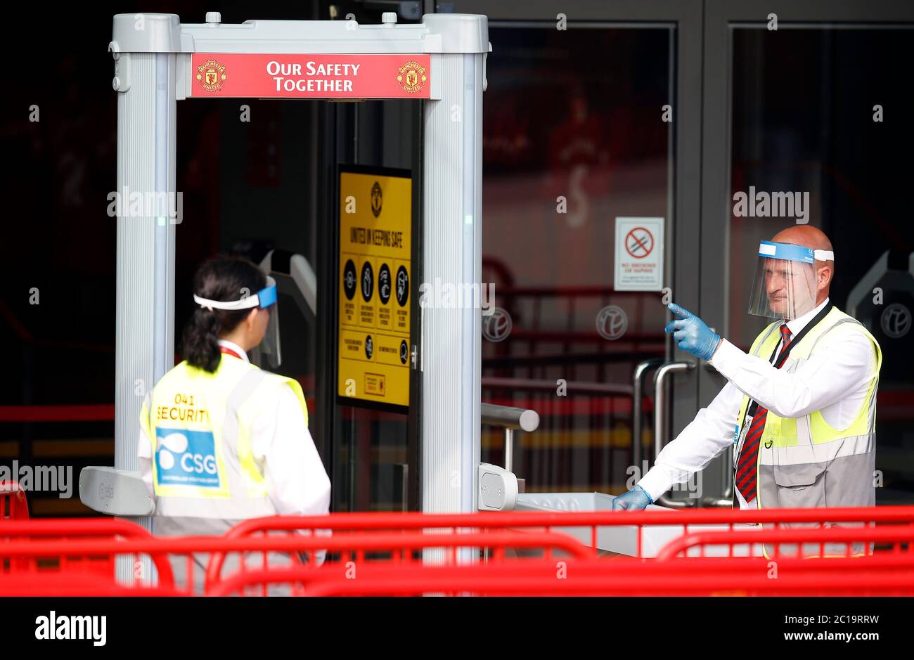 Staff wearing PPE at the Manchester United Club Shop, as the club ...