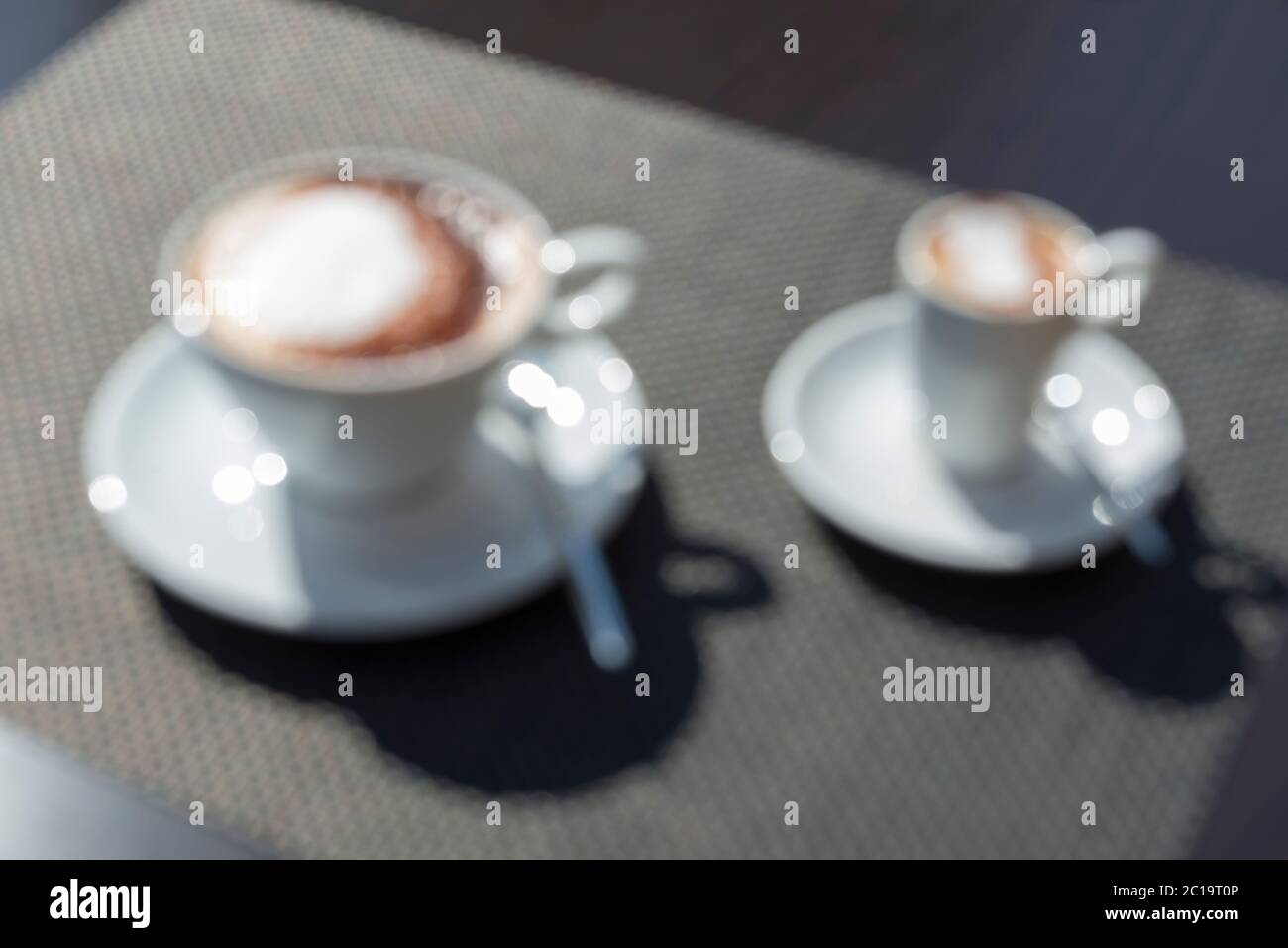 Big and small cups of coffee hi-res stock photography and images - Alamy