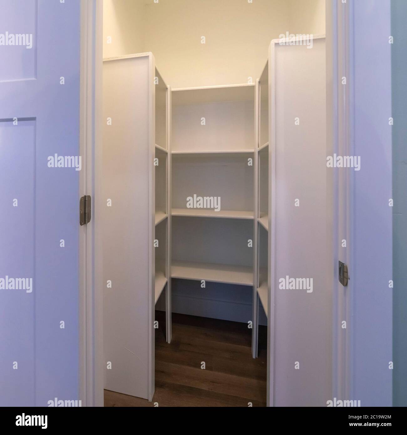 Square Looking into empty interior of a walk-in closet Stock Photo - Alamy