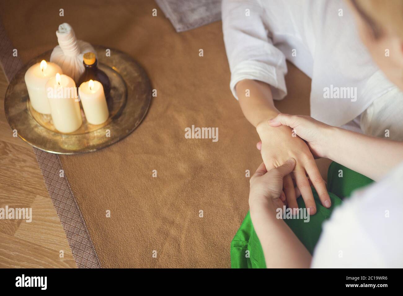 Hand massage at spa Stock Photo - Alamy