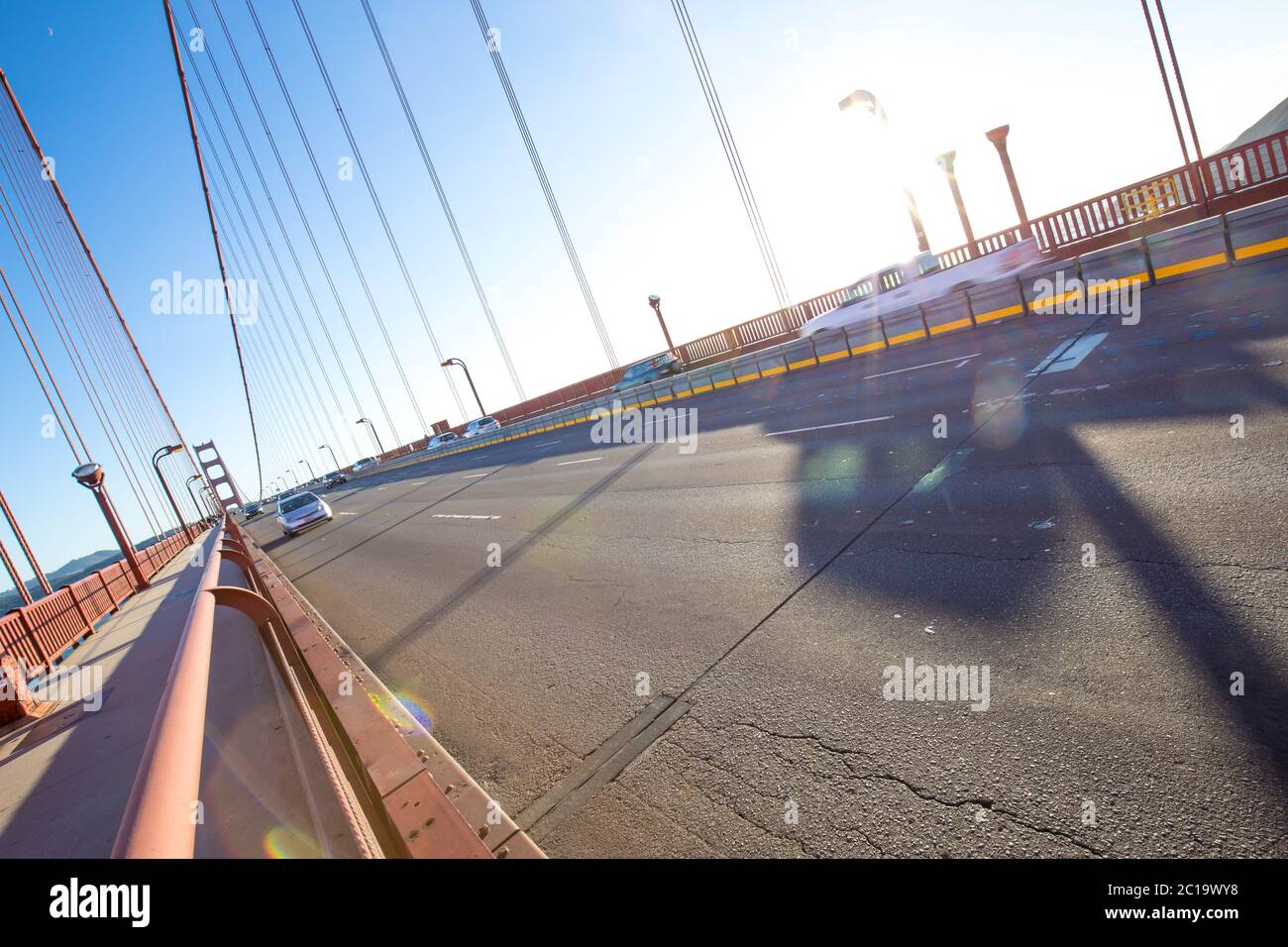 gold gated bridge in sunny sky Stock Photo - Alamy