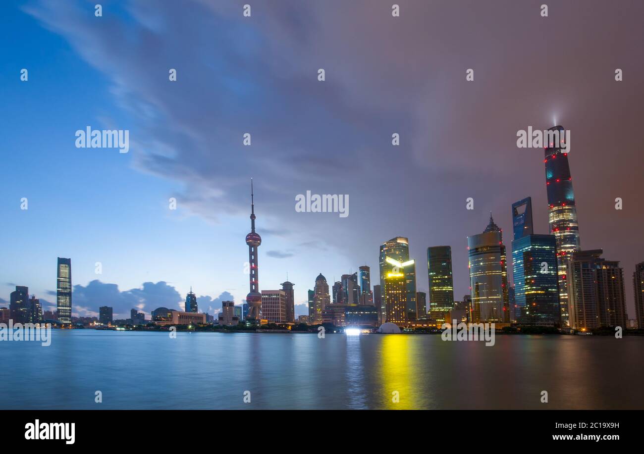 modern buildings near water in modern city Stock Photo - Alamy