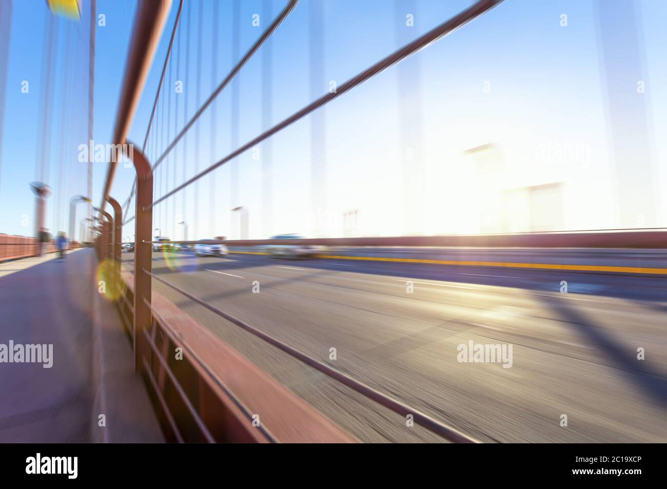 gold gated bridge in sunny sky Stock Photo - Alamy