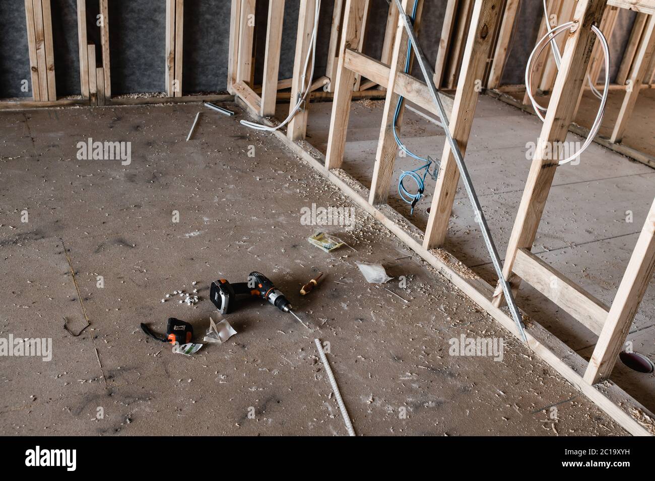 A construction set of a house being built with focus on tools on the ...