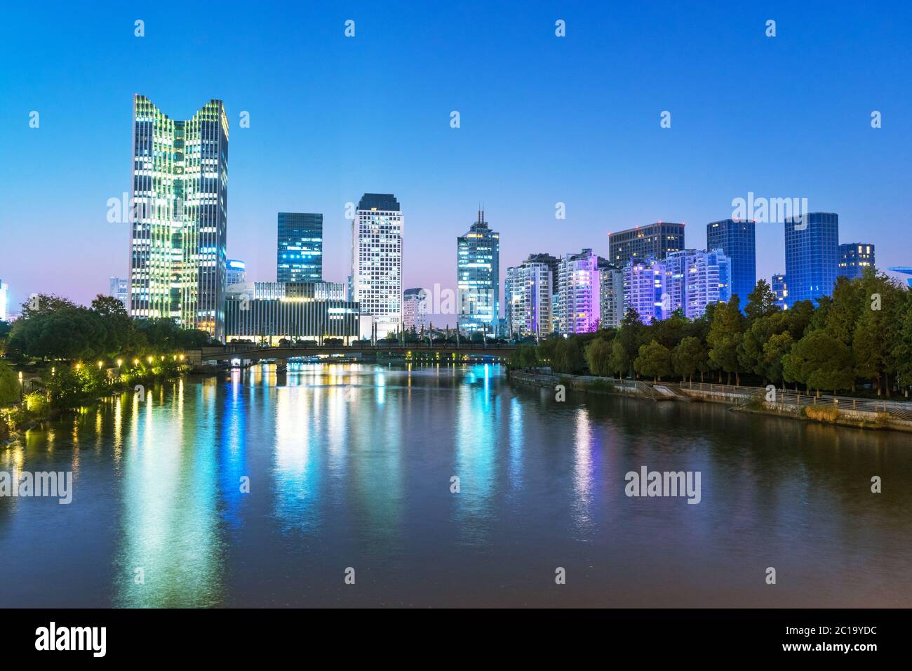 modern buildings near water in modern city Stock Photo - Alamy