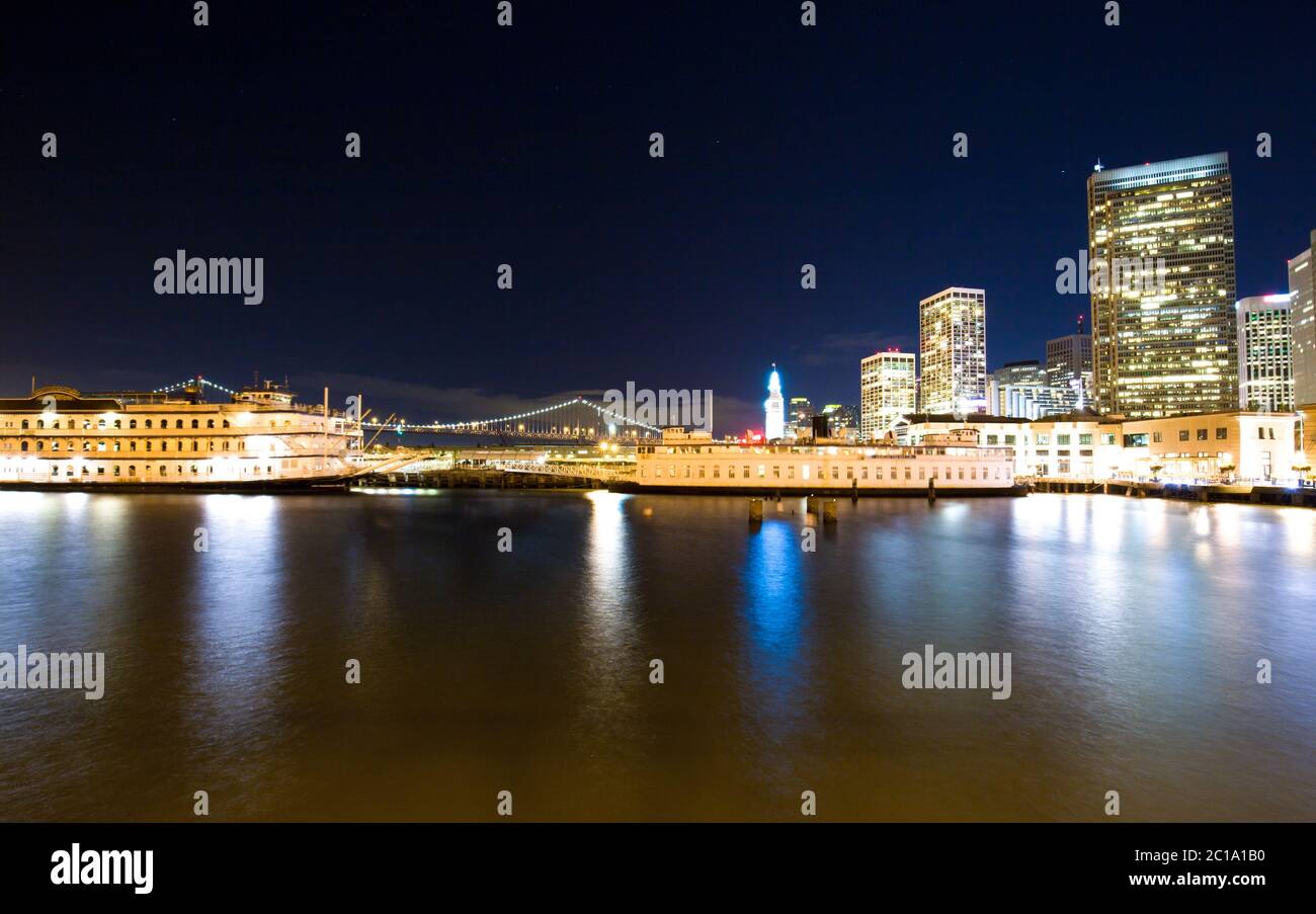 modern buildings near water in modern city Stock Photo - Alamy