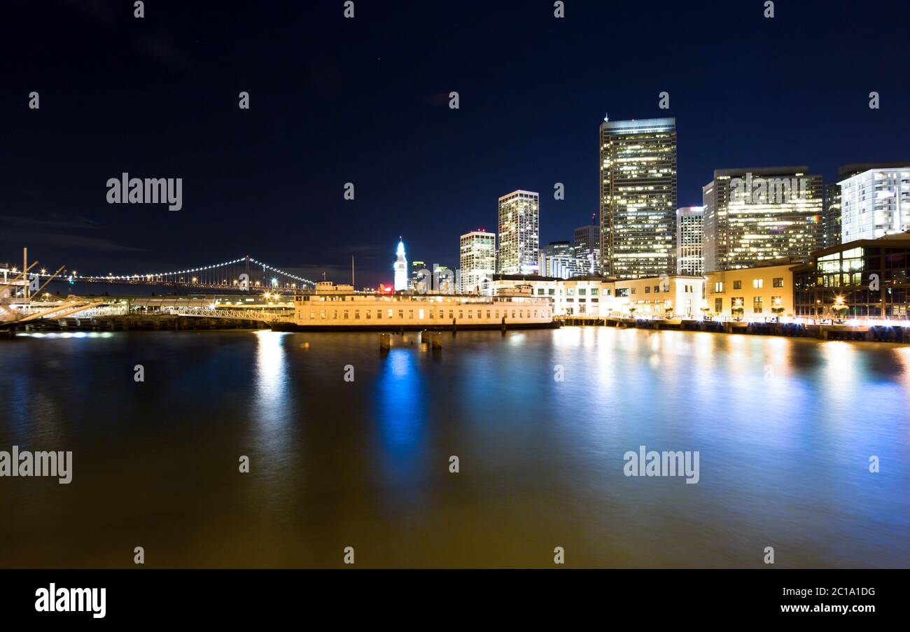 modern buildings near water in modern city Stock Photo - Alamy