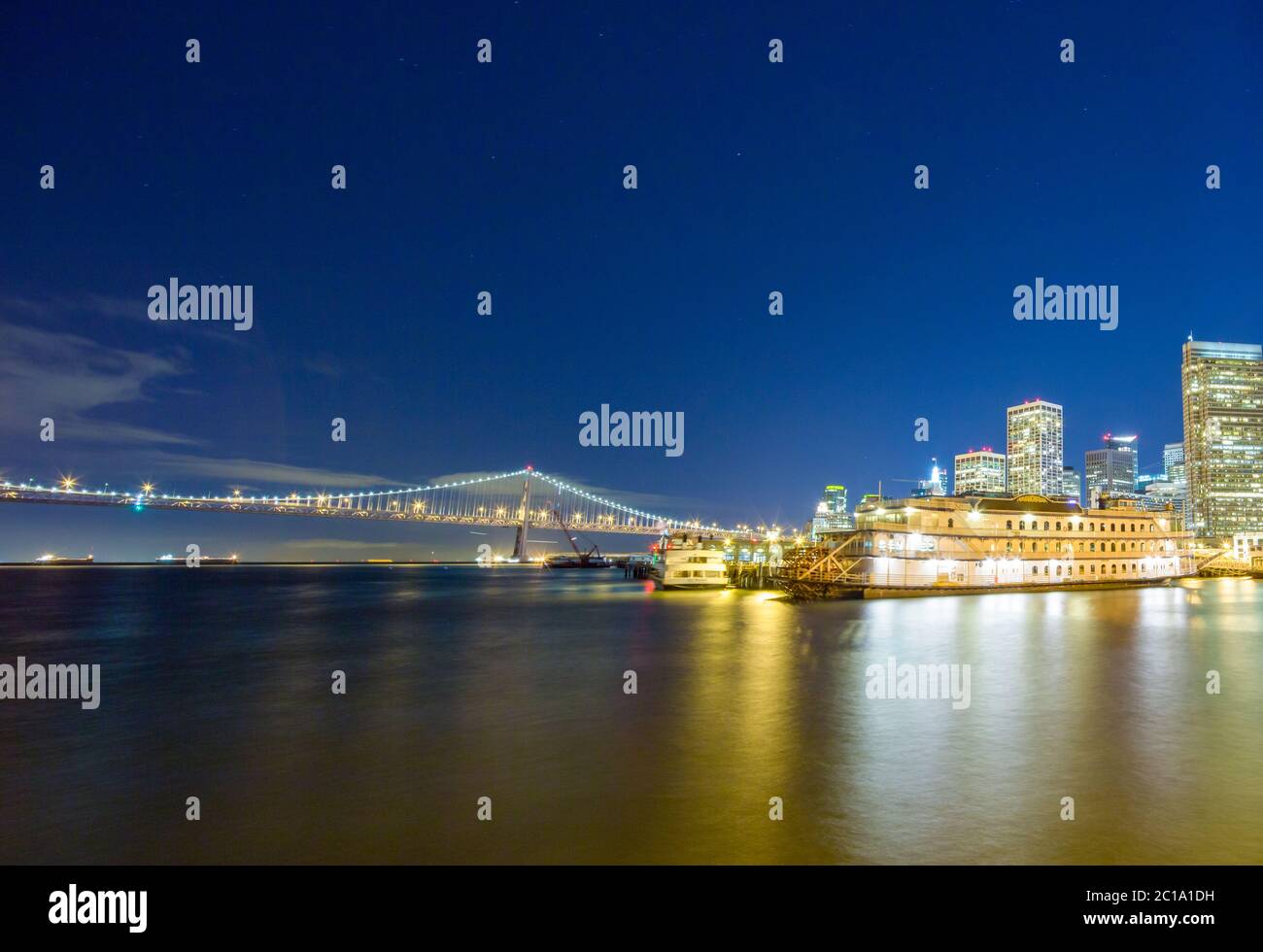 modern buildings near water in modern city Stock Photo - Alamy