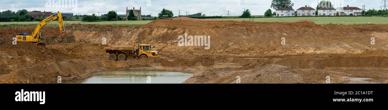 Phase 3 of the Kingsnorth Quarry, Hoo. The excavator digging and ...