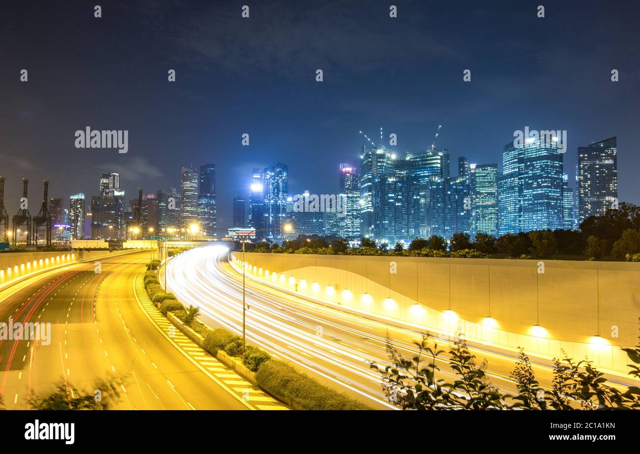 busy highway and modern buildings in modern city Stock Photo - Alamy