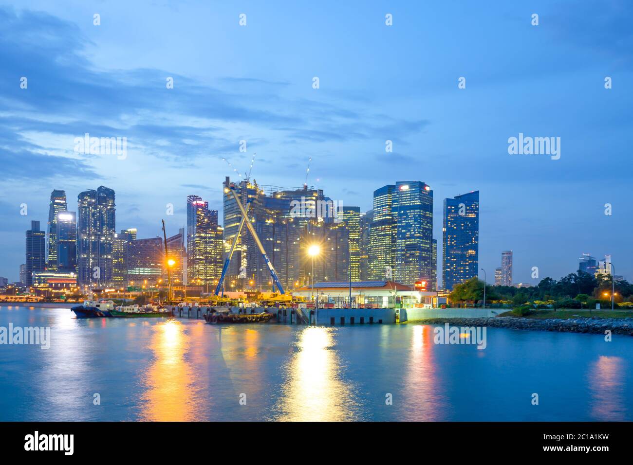 modern buildings near water in modern city Stock Photo - Alamy