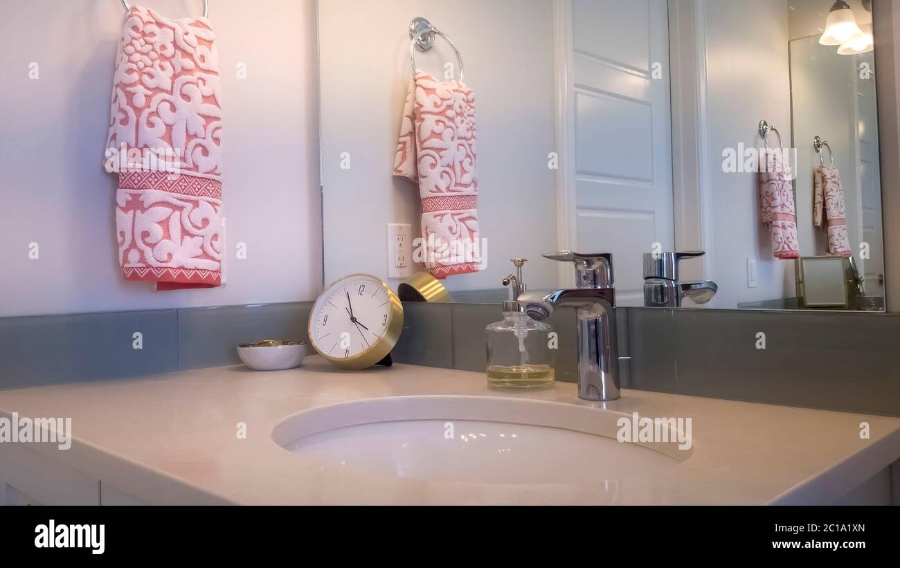 Panorama Close up of sink faucet cabinet and mirror inside the bathroom ...