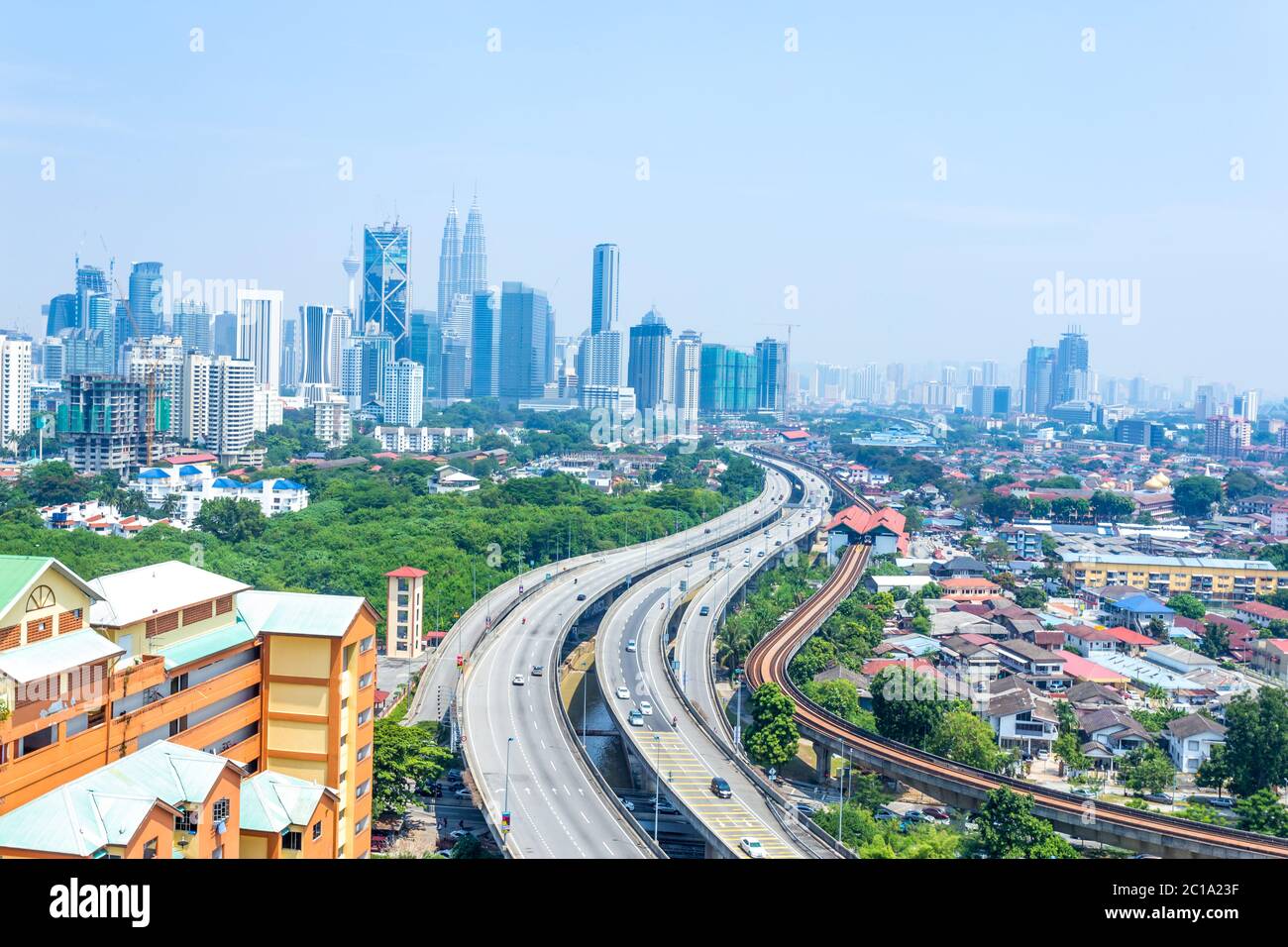 aerial view of residential buildings near elevated road in midtown of ...
