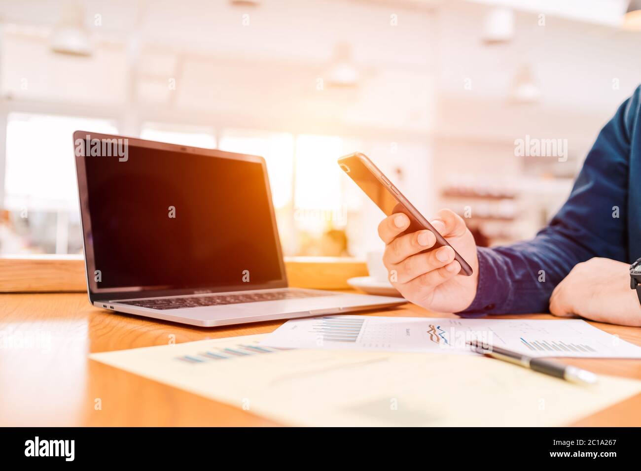 Account manager using mobile phone. businessman working with modern ...