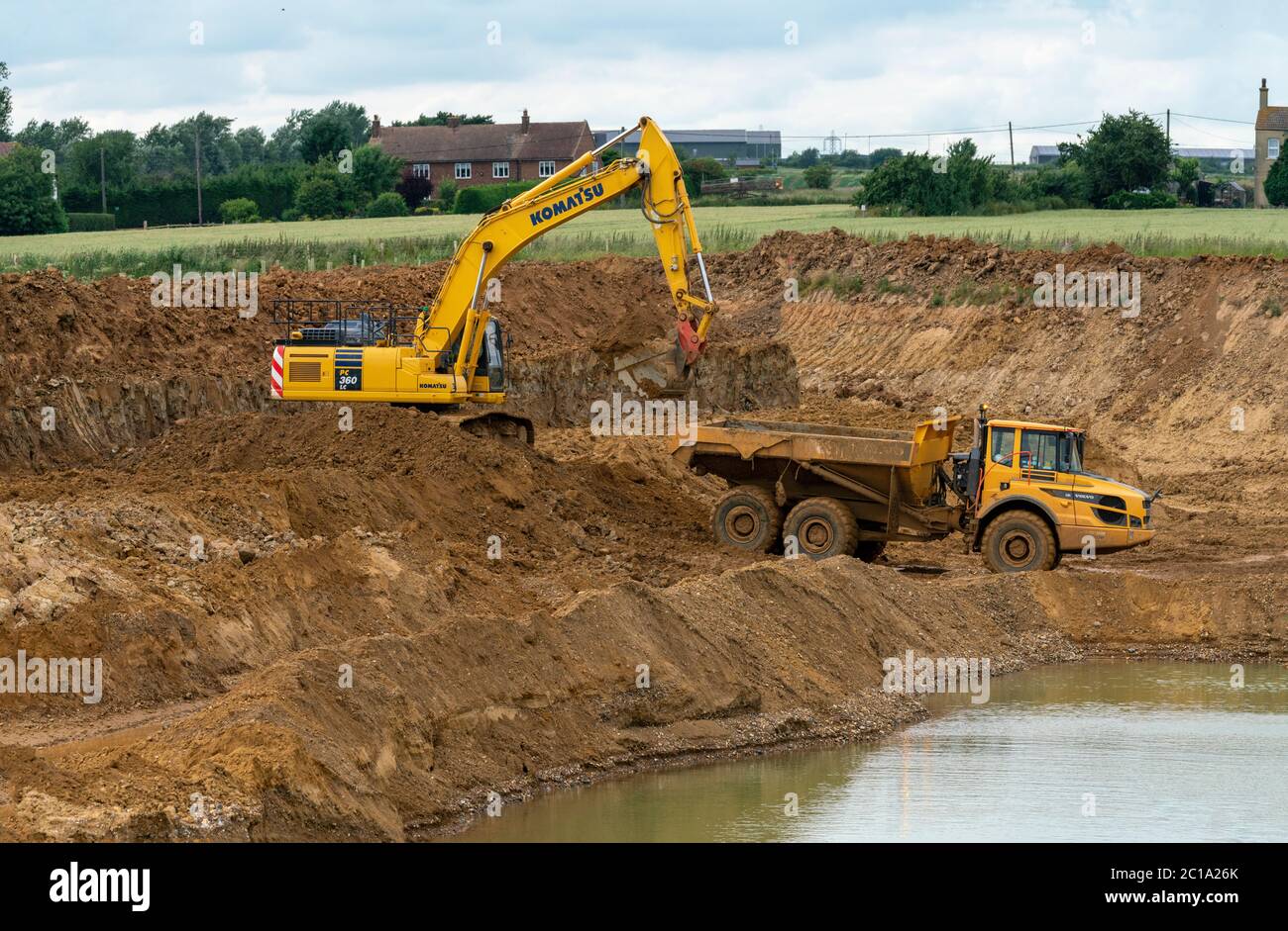Phase 3 of the Kingsnorth Quarry, Hoo. The excavator digging and ...