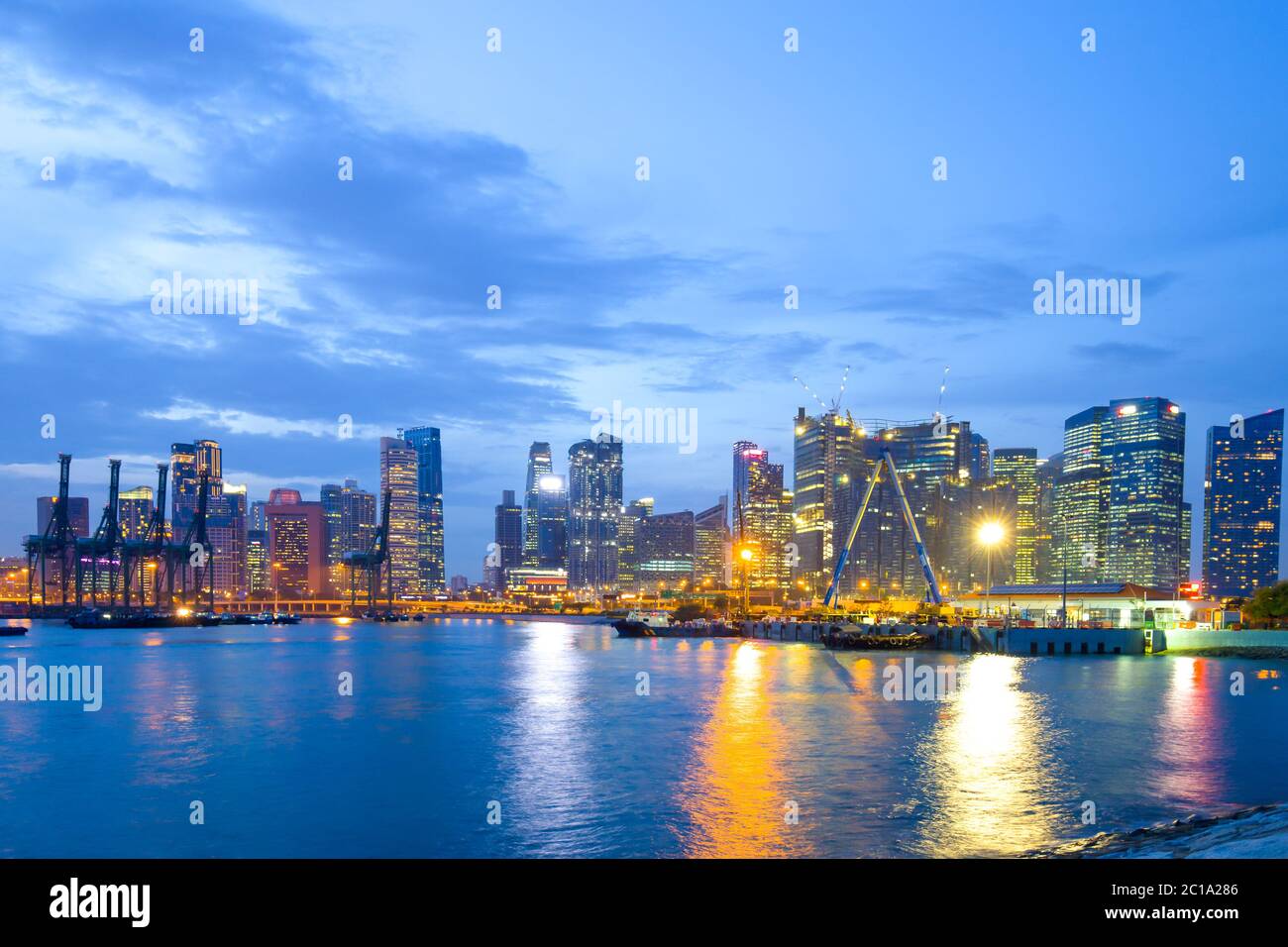 modern buildings near water in modern city Stock Photo - Alamy