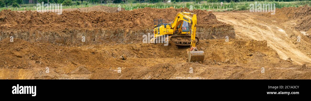 Phase 3 of the Kingsnorth Quarry, Hoo. The excavator digging and ...