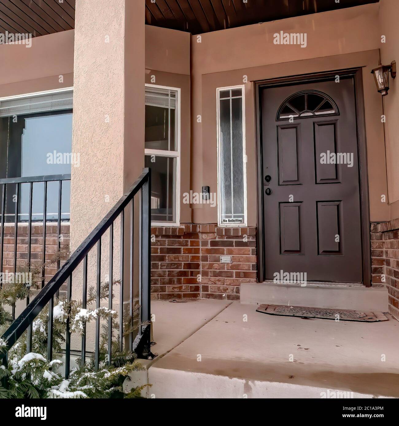 Square Home with bay window sidelight and glass paned wooden door ...