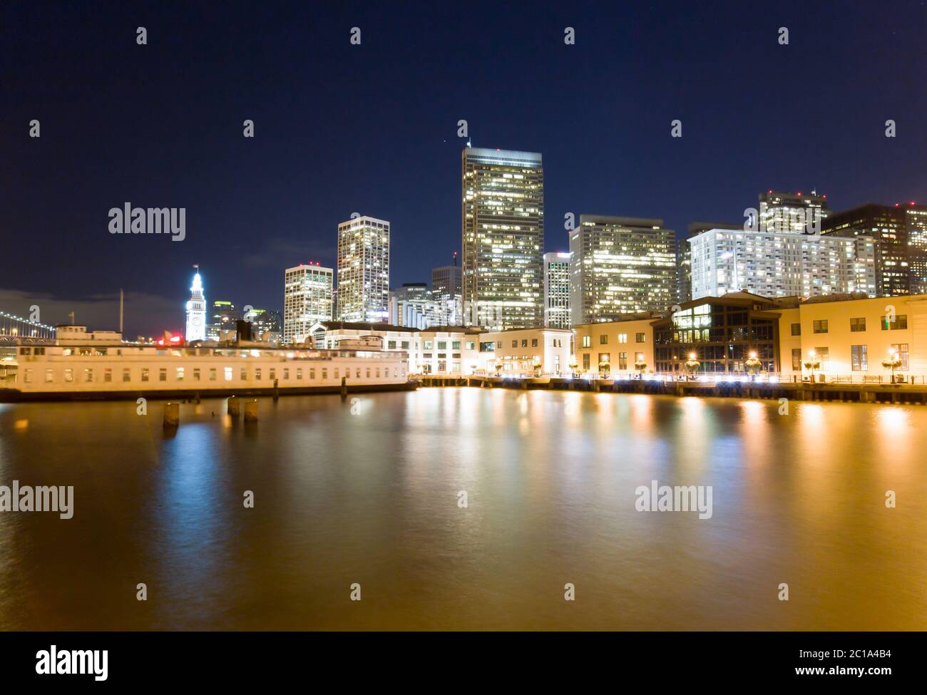 modern buildings near water in modern city Stock Photo - Alamy