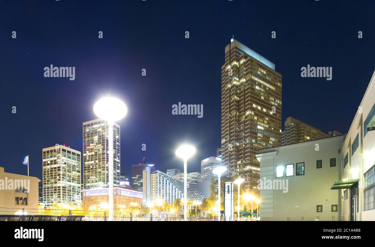 night scene of modern buildings in modern city Stock Photo - Alamy