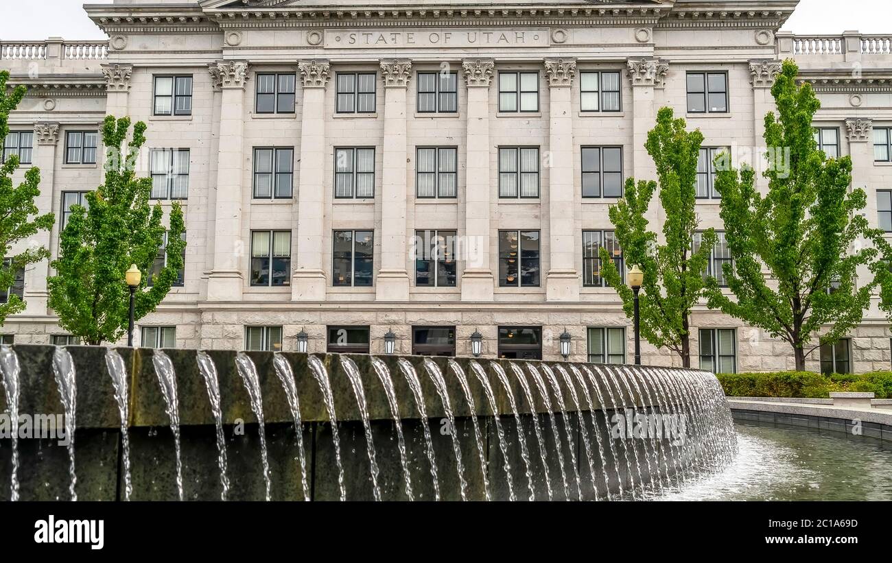 Panorama frame Water pool fountain against Utah State Capital building ...