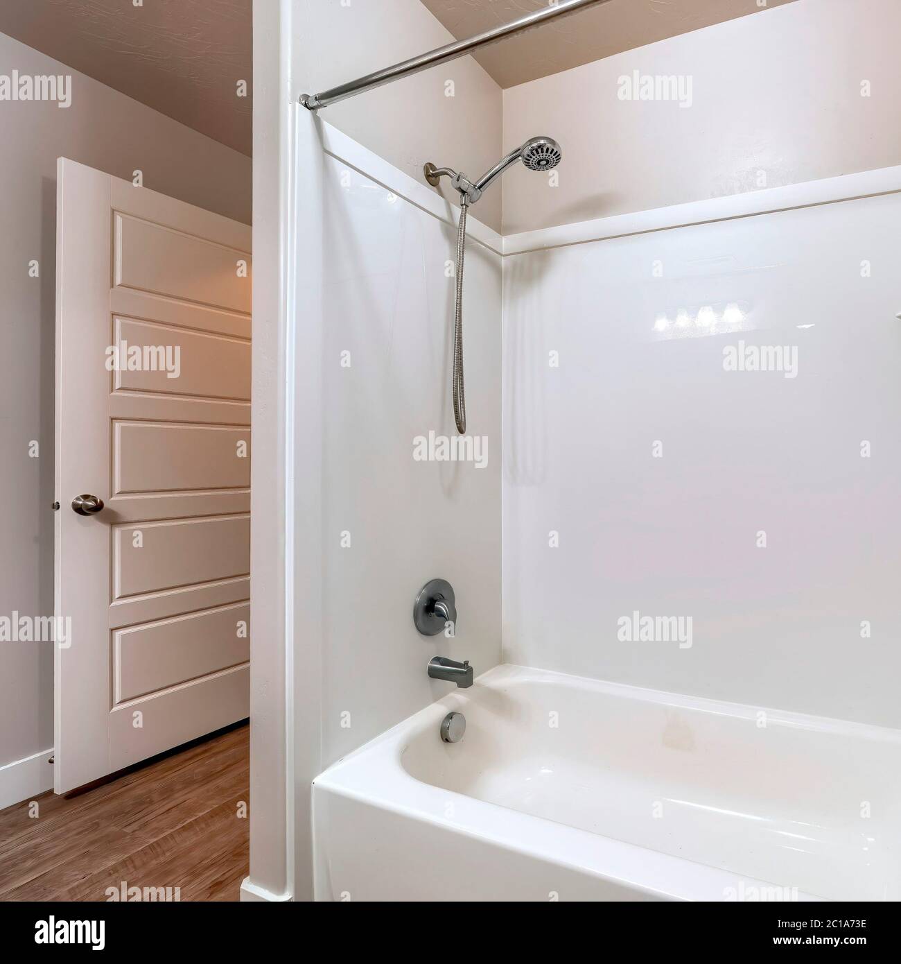 Square frame BAthroom interior with built in bathtub stainless steel ...